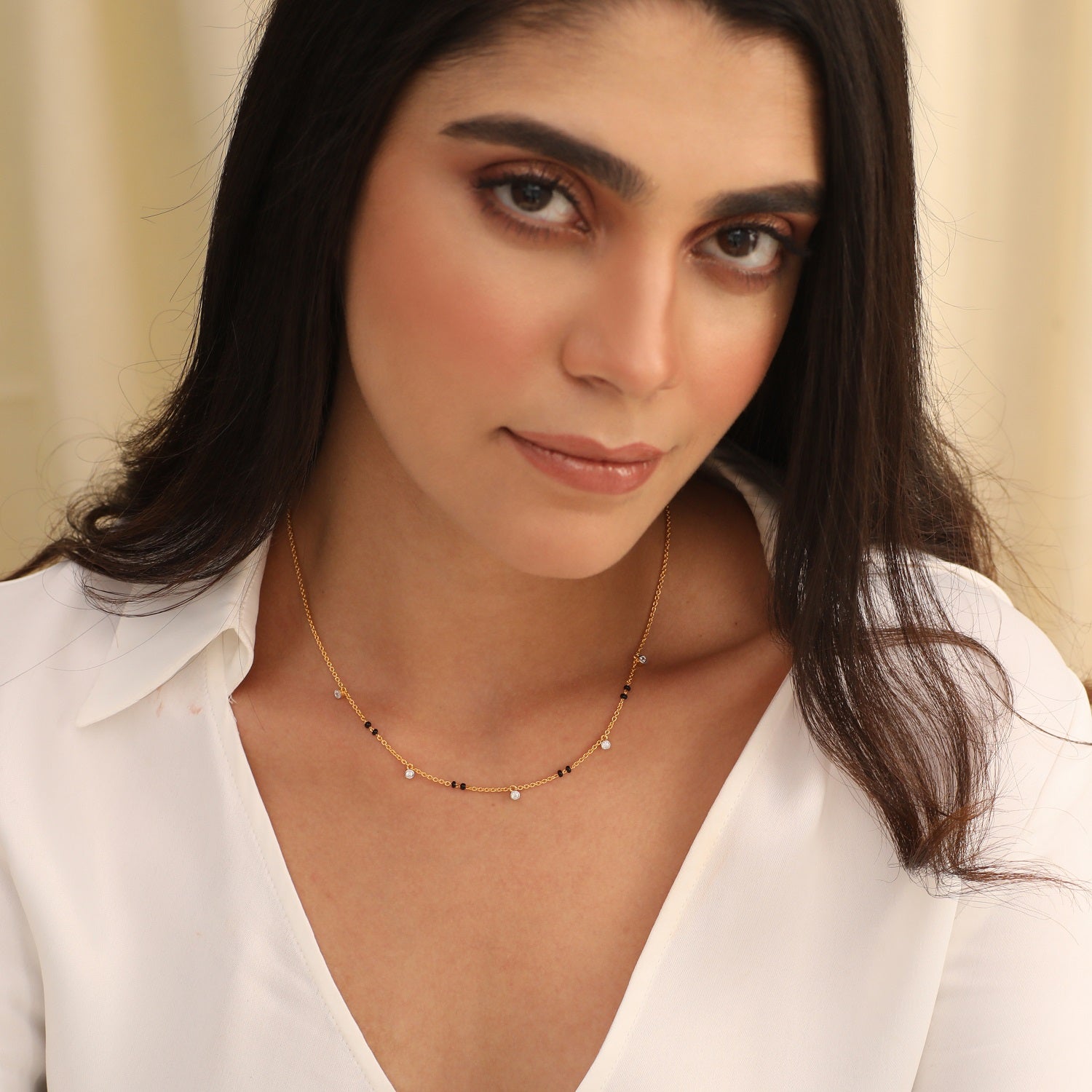 Style with Paksha s Cubic Zirconia Silver Mangalsutra Shop now